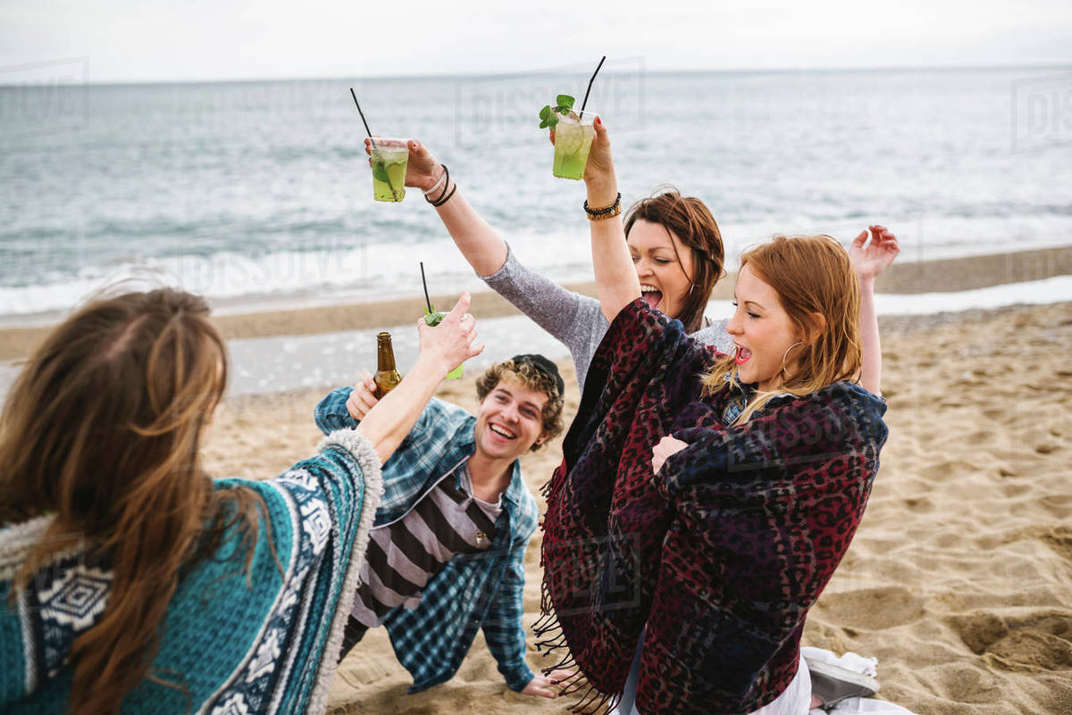 Friends raising at toast at beach party, Barcelona, Spain - Stock Photo ...