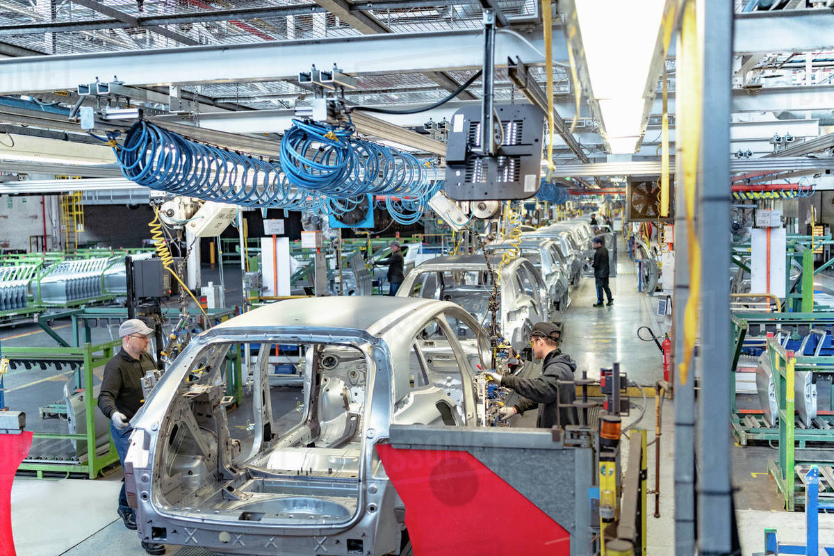 Cars on production line in car factory - Stock Photo - Dissolve