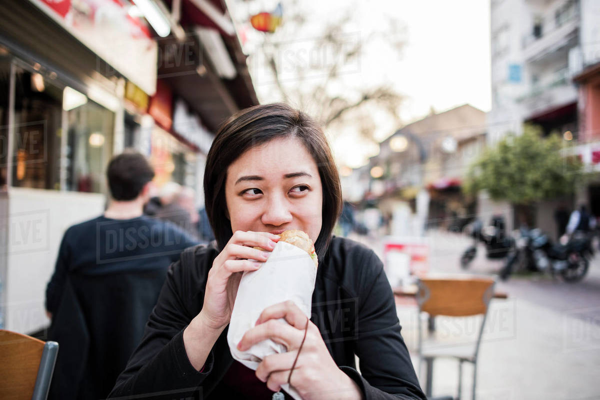 Woman eating kebab bread at cafe, Kusadasi, Izmir, Turkey - Royalty ...