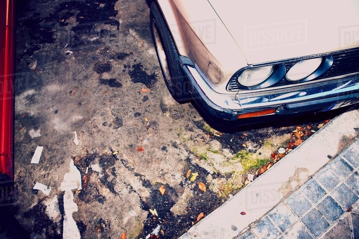 High angle cropped image of car parked next to kerb - Royalty-free ...