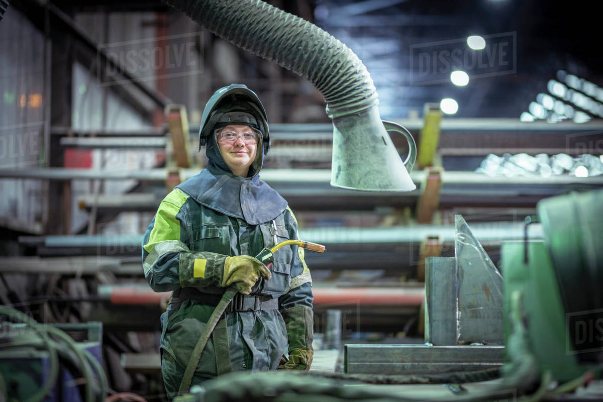Portrait of female welder in steelworks - Royalty-free Stock Photo ...