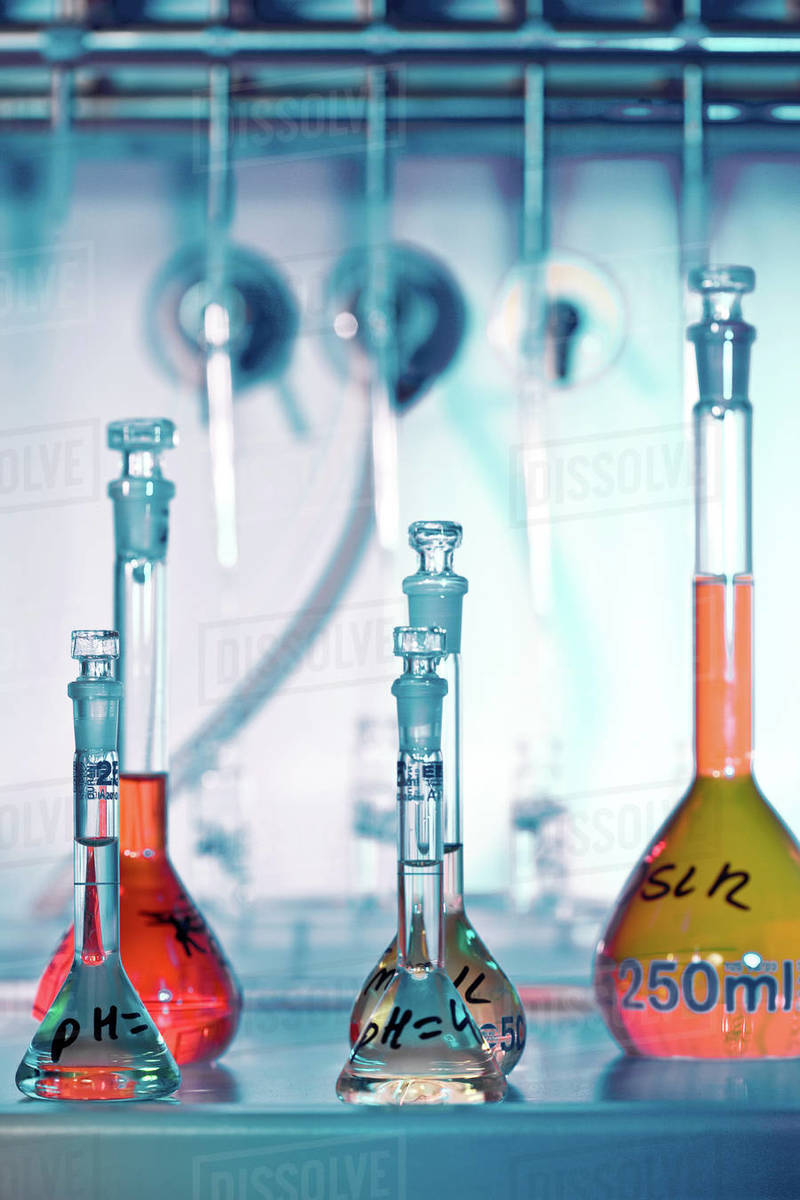 Colorful chemistry flasks in a laboratory setting - Royalty-free Stock ...