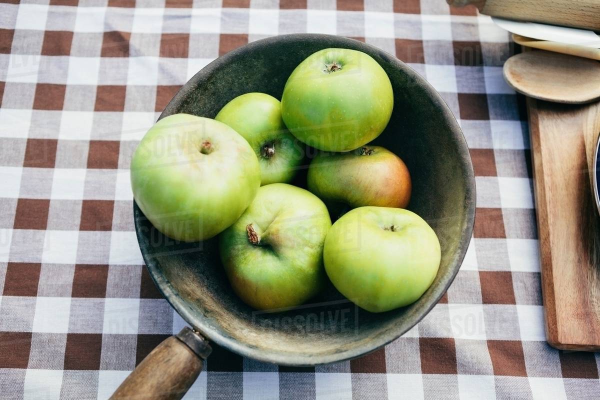 Apples in a pan - Royalty-free Stock Photo | Dissolve