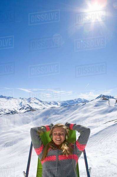 Girl sitting in sun - Stock Photo - Dissolve