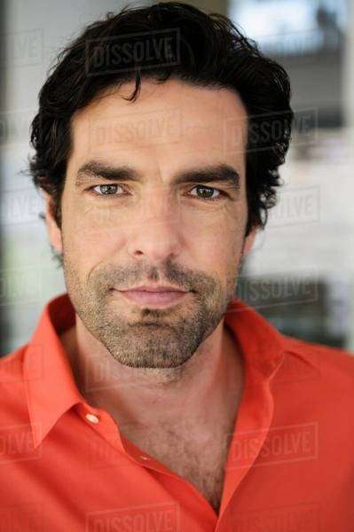 Close up of mans smiling face - Stock Photo - Dissolve