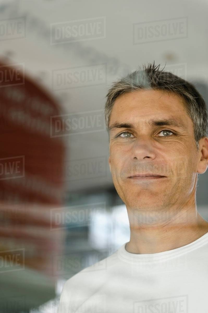 Close up of mans smiling face - Stock Photo - Dissolve