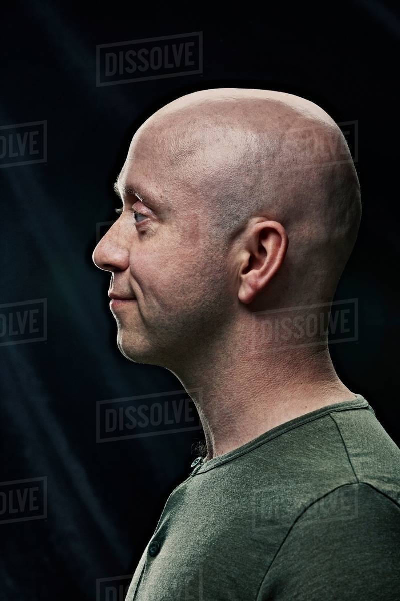 Profile view of bald man - Royalty-free Stock Photo | Dissolve