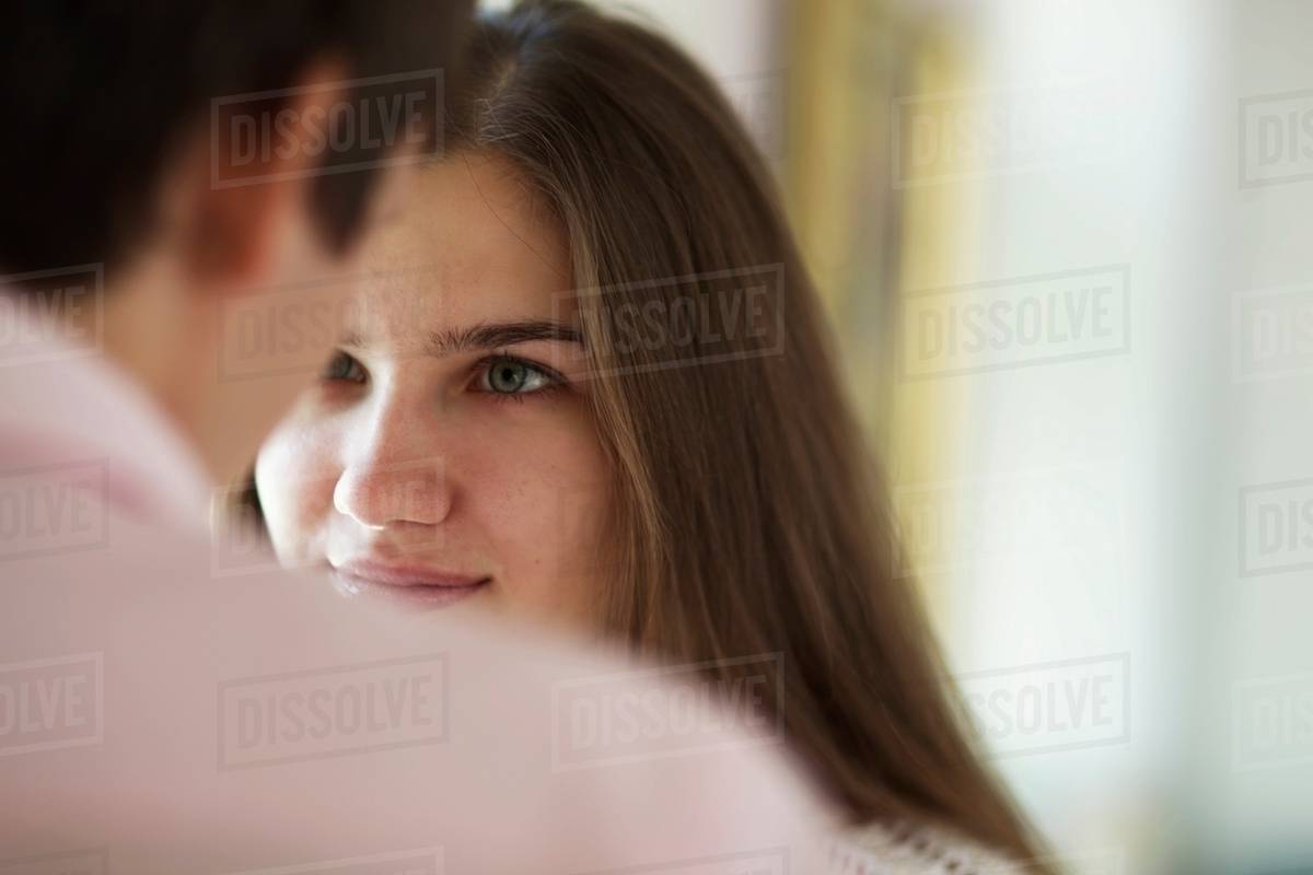 Couple looking into each others eyes - Stock Photo - Dissolve