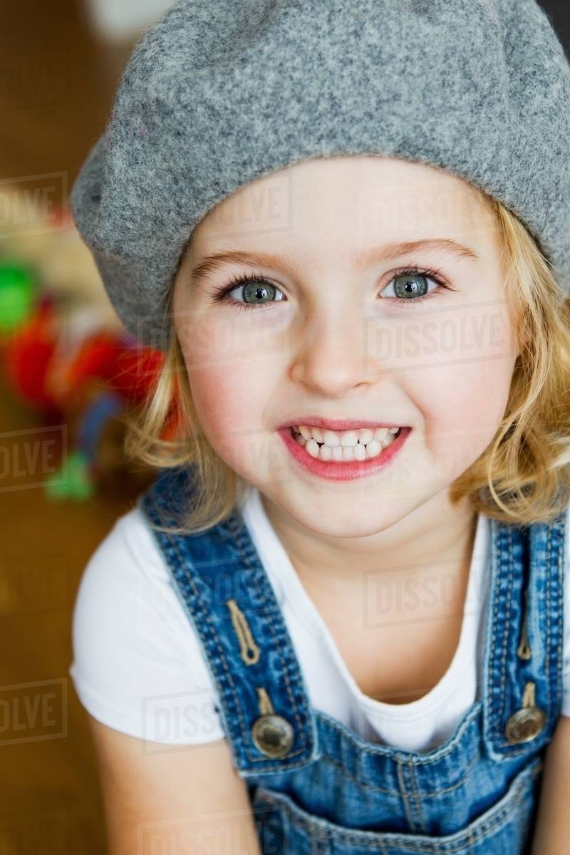 Close up of girls smiling face - Royalty-free Stock Photo | Dissolve