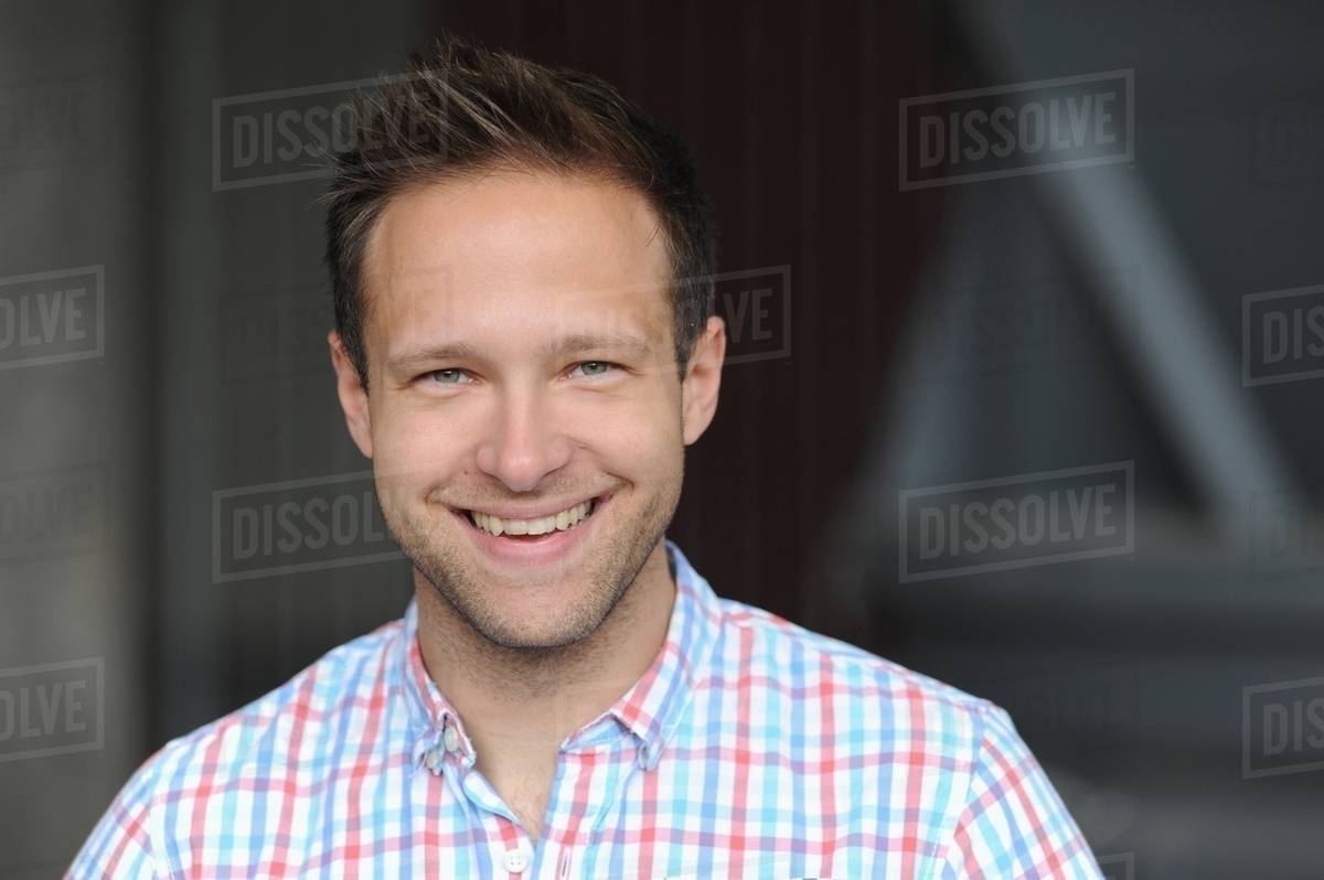 Close up of man?s smiling face - Royalty-free Stock Photo | Dissolve