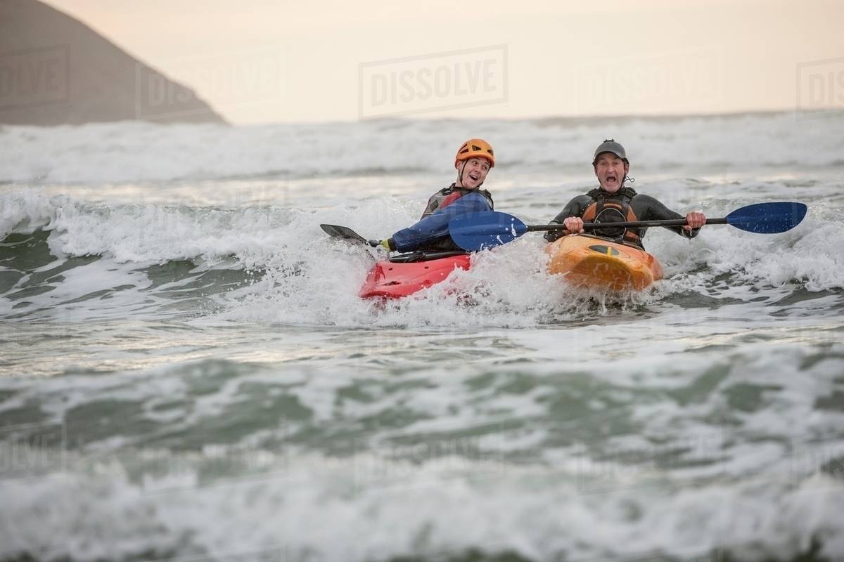 Two men sea kayaking - Stock Photo - Dissolve