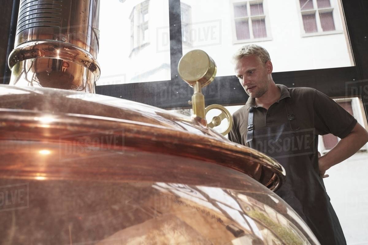 Man working at brewery - Royalty-free Stock Photo | Dissolve