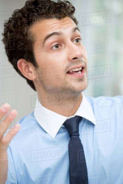 Young man talking - Royalty-free Stock Photo | Dissolve
