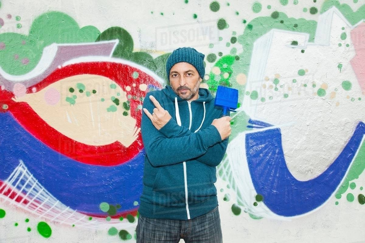 Man making gang signs - Royalty-free Stock Photo | Dissolve