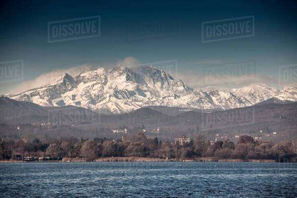 Mount Rosa beyond Lake Maggiore, Arona, Italy - Stock Photo - Dissolve