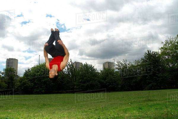 Somersault in park - Royalty-free Stock Photo | Dissolve