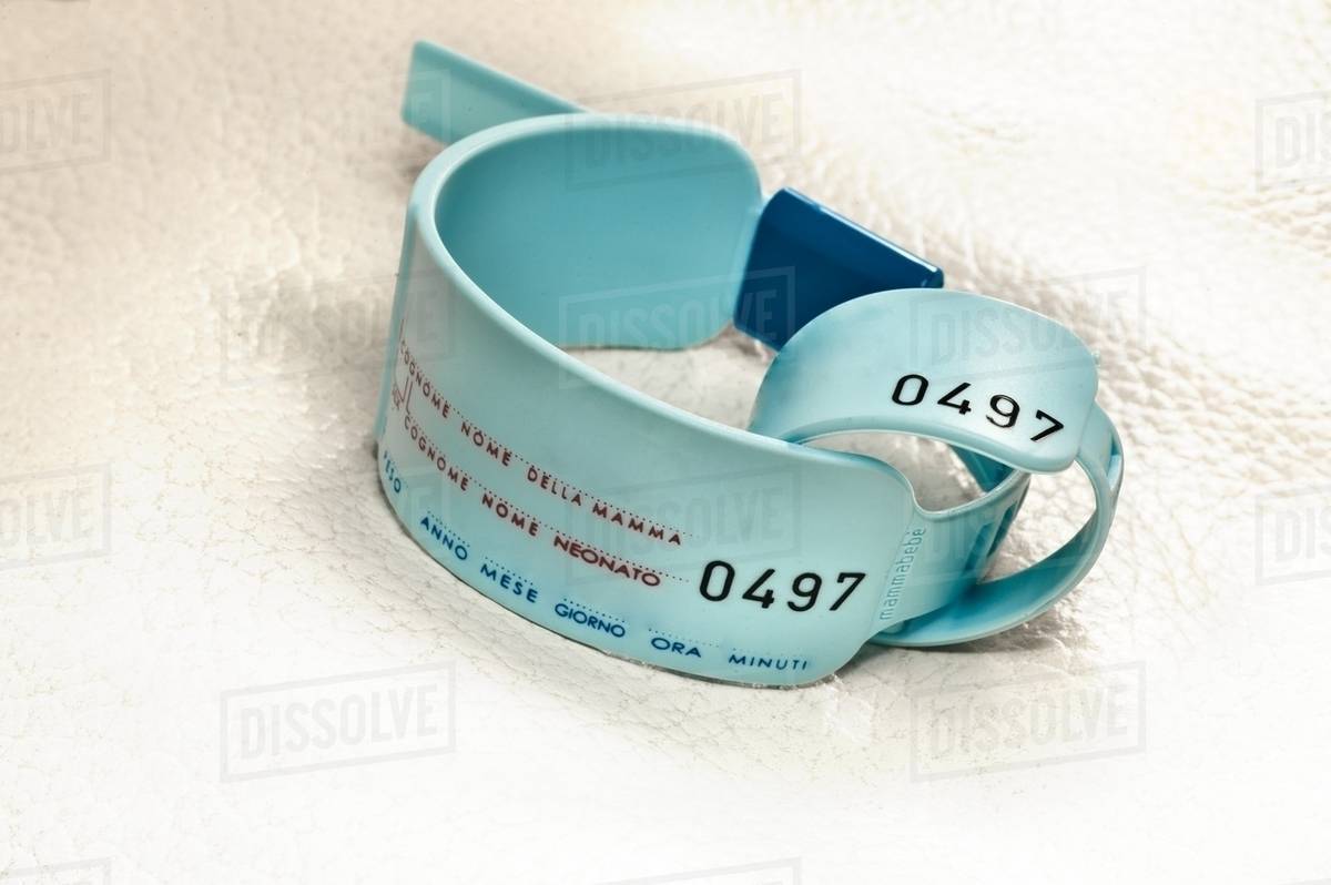 Newborn and mum hospital bracelets - Royalty-free Stock Photo | Dissolve