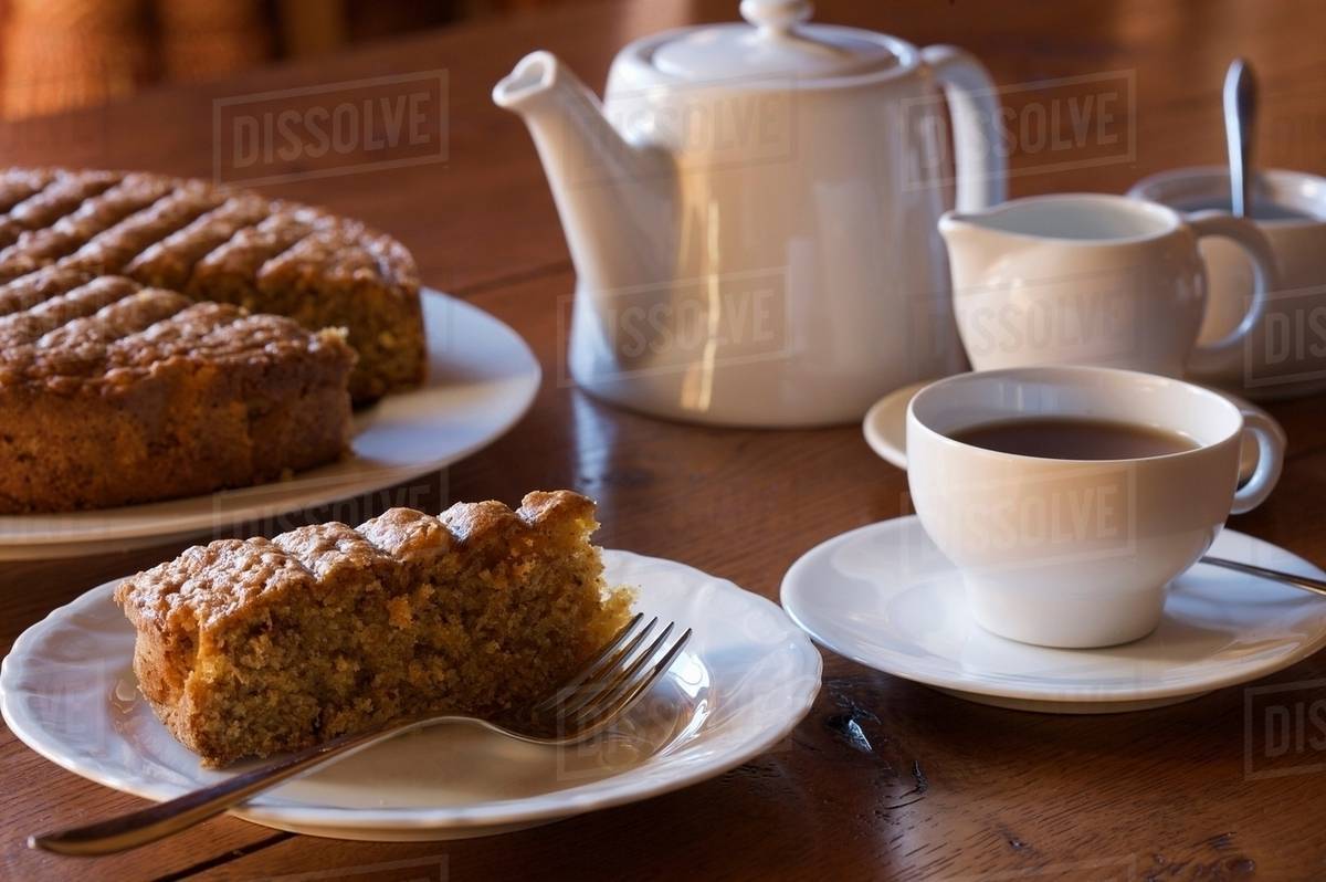 Coffee and cake on table - Royalty-free Stock Photo | Dissolve