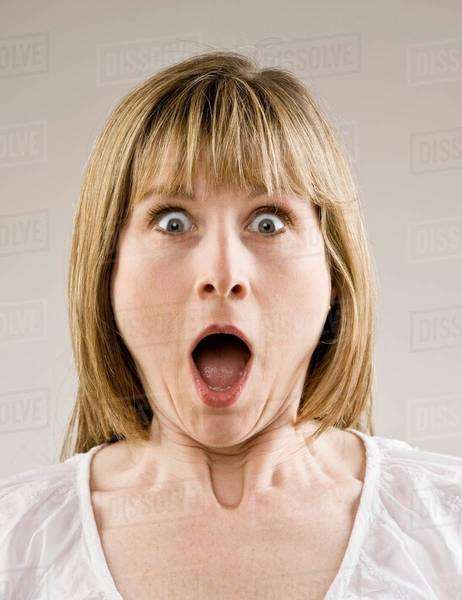 Surprised woman gasping - Royalty-free Stock Photo | Dissolve
