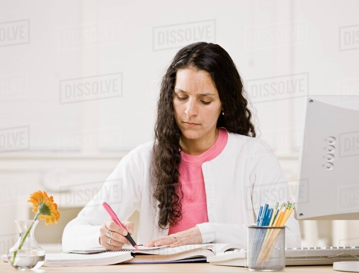Woman studying at computer - Royalty-free Stock Photo | Dissolve