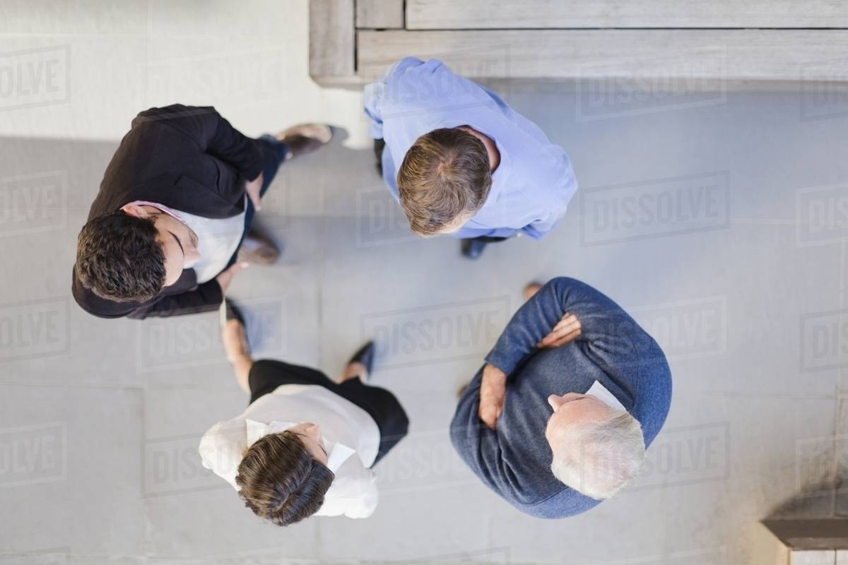 Overhead view of business people talking - Royalty-free Stock Photo ...