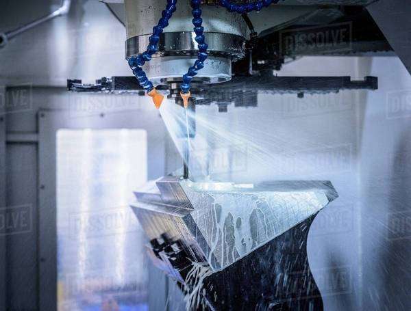 Inside CNC cutting machine in engineering factory - Stock Photo - Dissolve