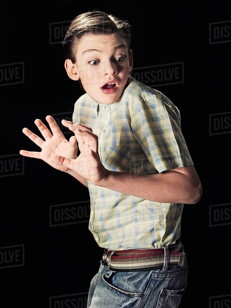 Frightened boy gasping - Royalty-free Stock Photo | Dissolve