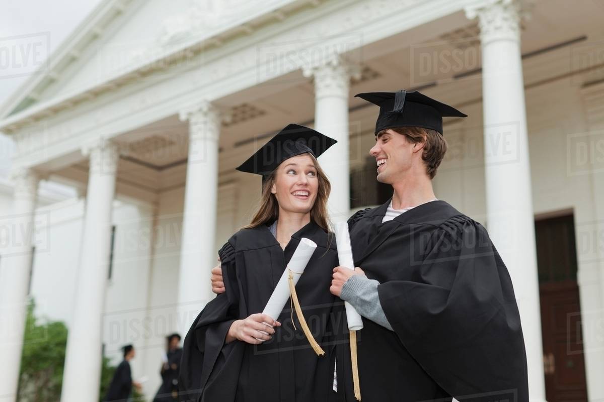 Graduates with their degrees on campus - Royalty-free Stock Photo ...