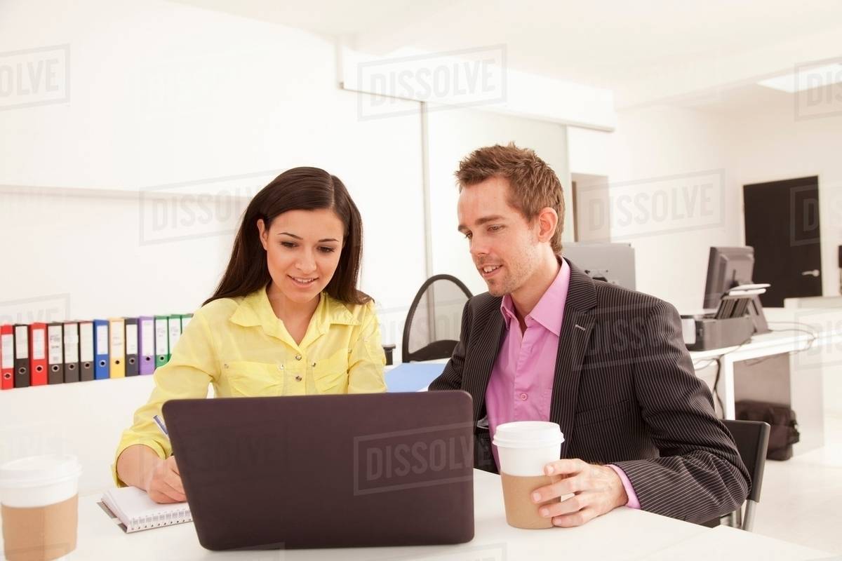 Business people at work in office - Royalty-free Stock Photo | Dissolve