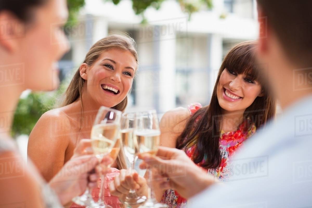 Friends toasting each other - Royalty-free Stock Photo | Dissolve