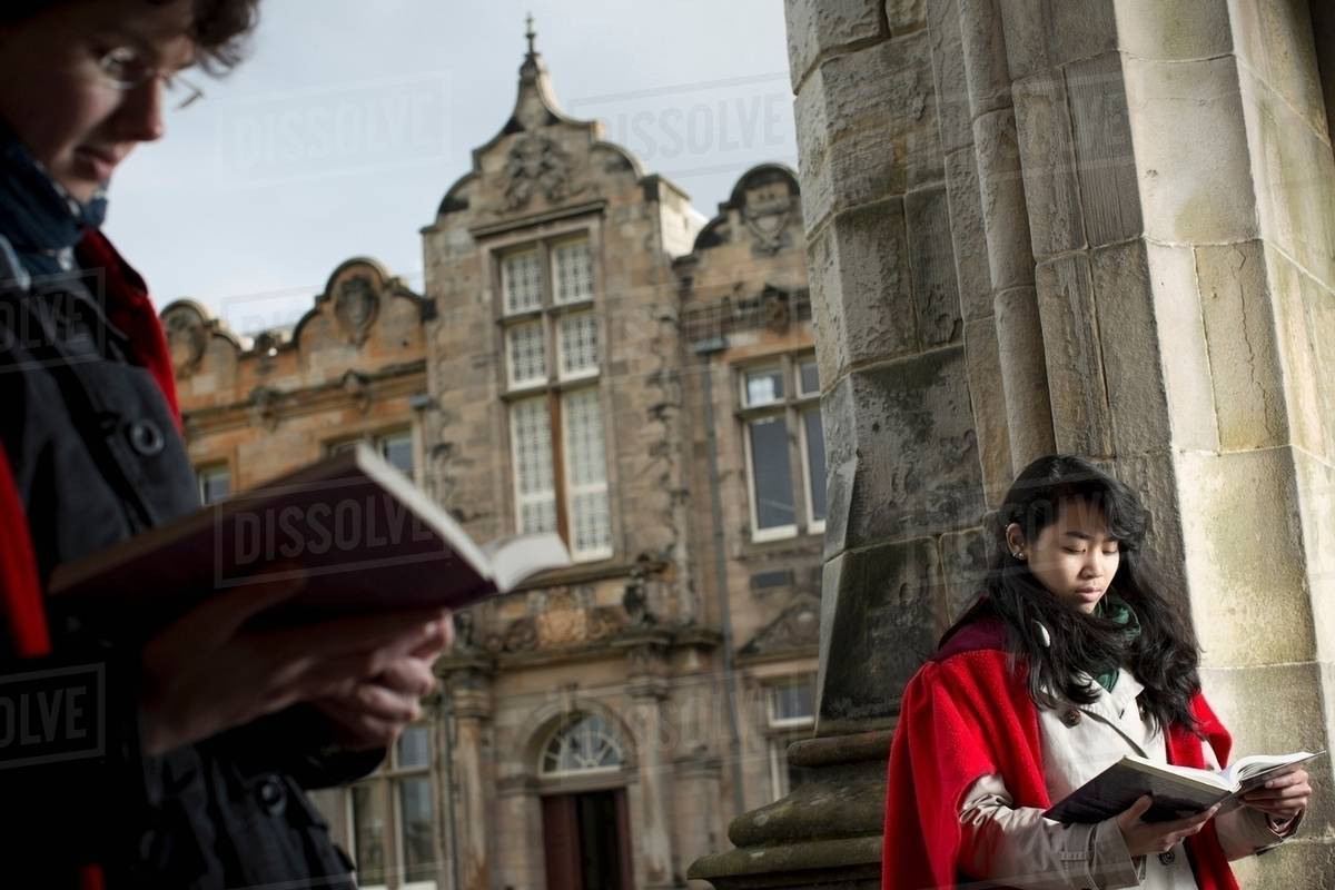 University students in traditional capes - Stock Photo - Dissolve