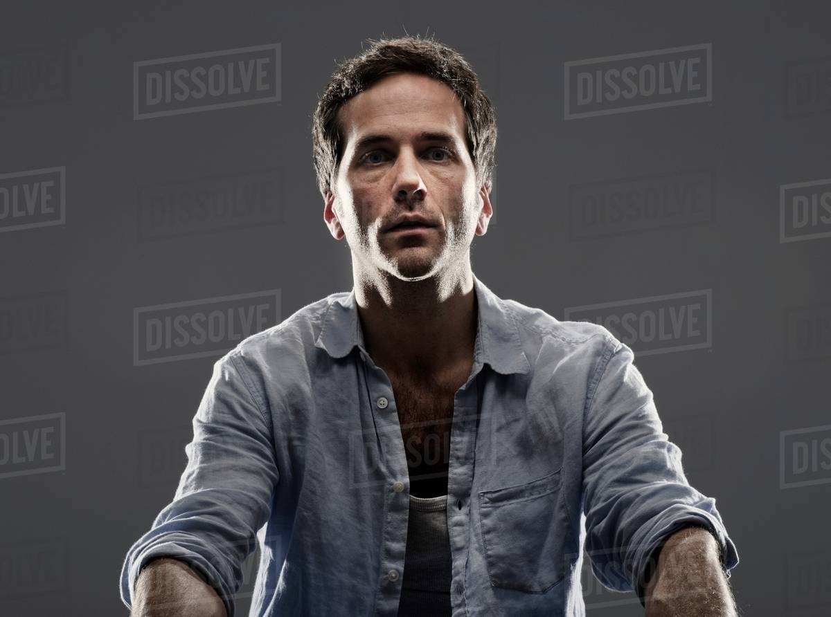 Close up of mans serious face - Royalty-free Stock Photo | Dissolve