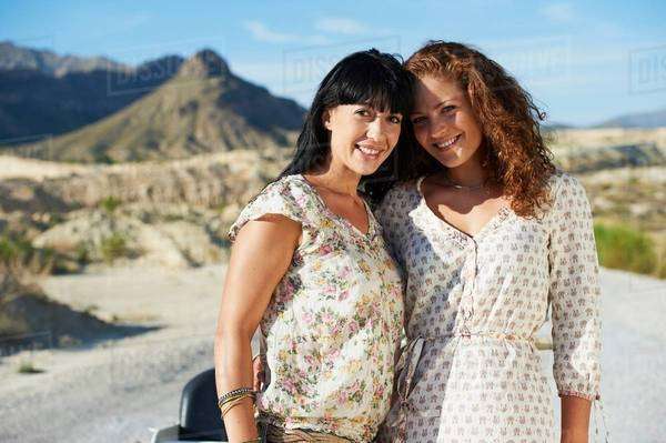 Portrait of two women on the road - Royalty-free Stock Photo | Dissolve