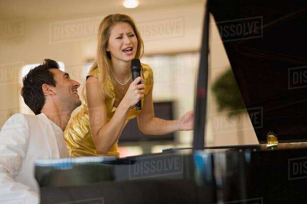 Girl singing - Royalty-free Stock Photo | Dissolve