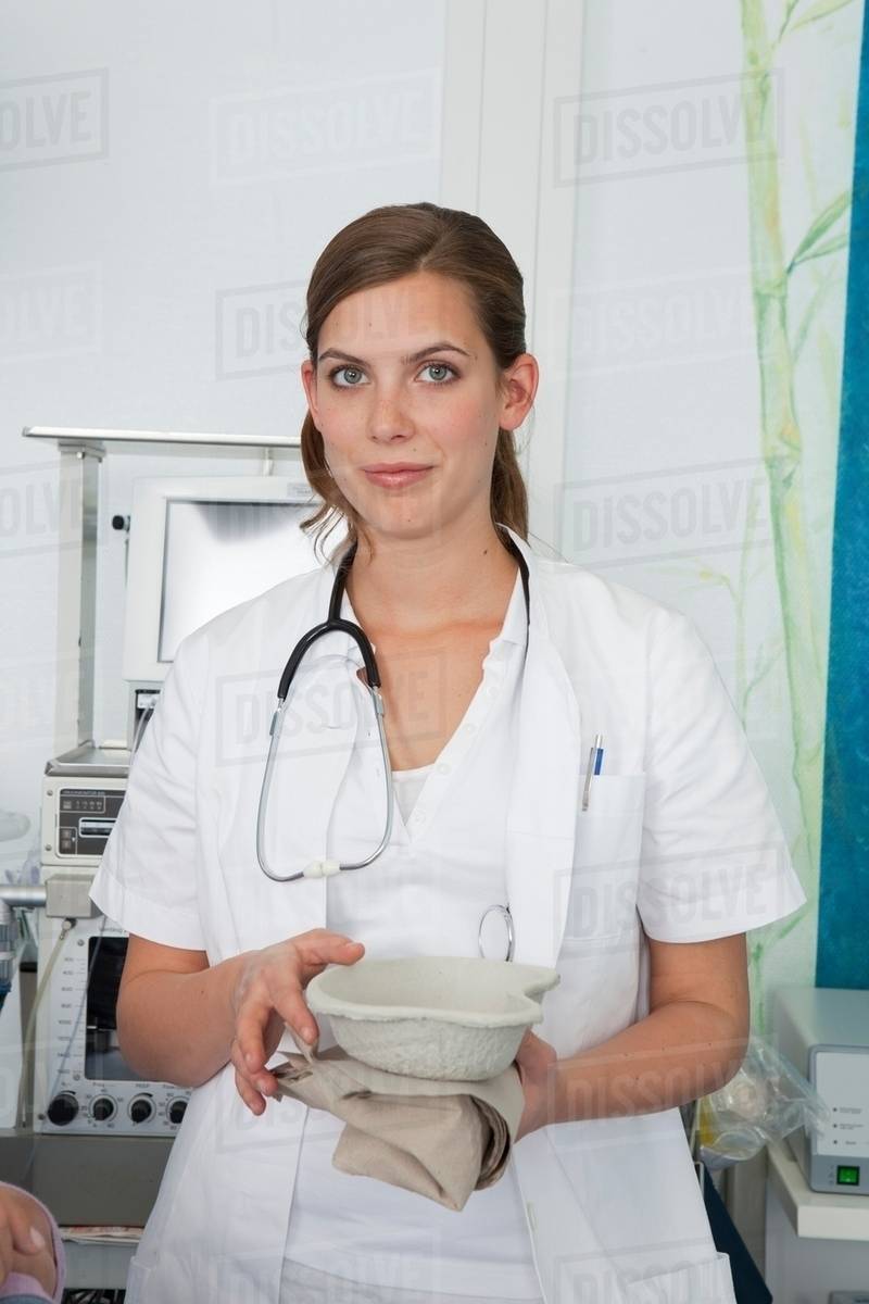Nurse with set of instruments - Royalty-free Stock Photo | Dissolve