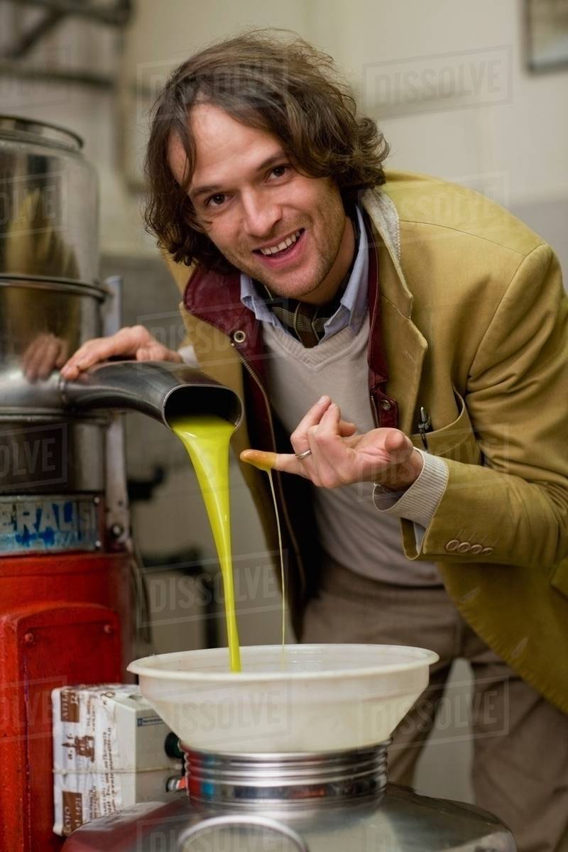 Businessman showing production - Stock Photo - Dissolve