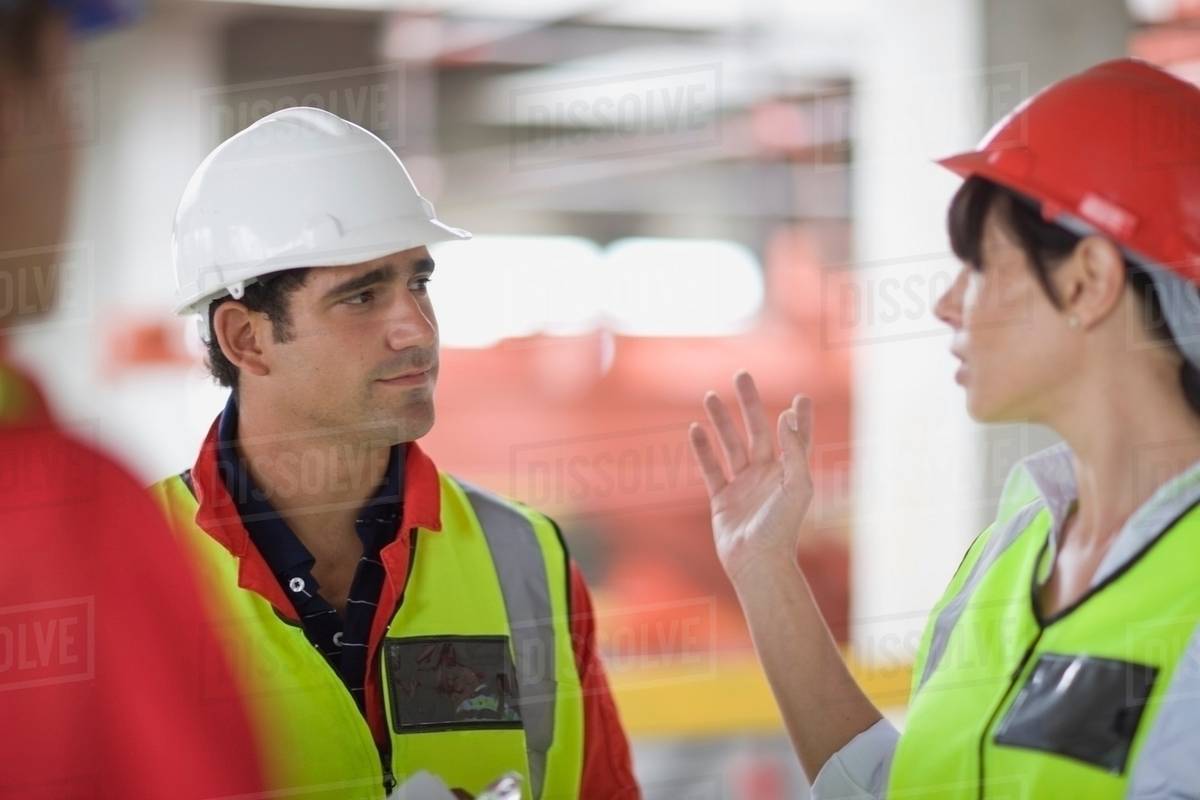 Architect talking to builder - Royalty-free Stock Photo | Dissolve