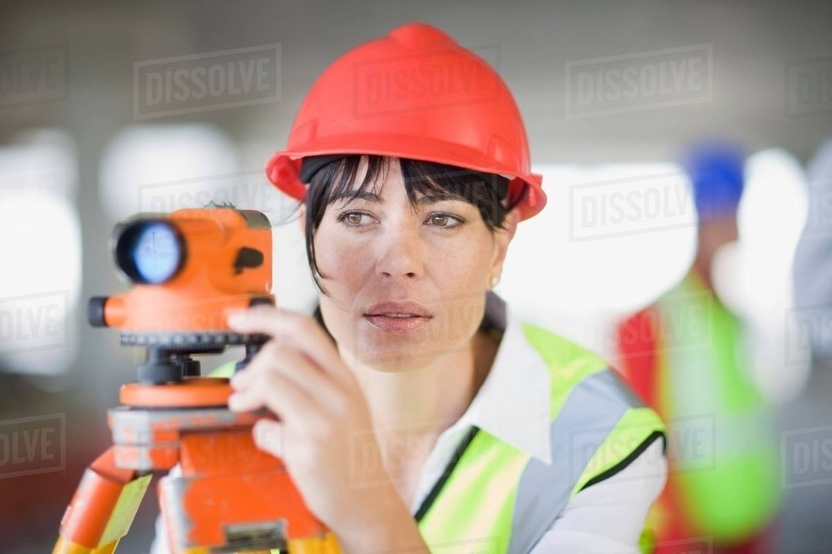 Architect doing measuring - Royalty-free Stock Photo | Dissolve