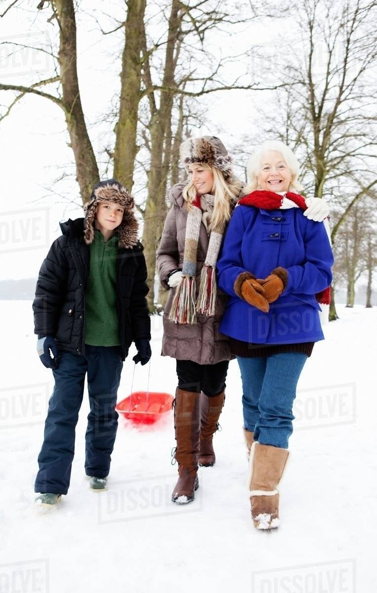 A family out for a walk in the snow - Royalty-free Stock Photo | Dissolve