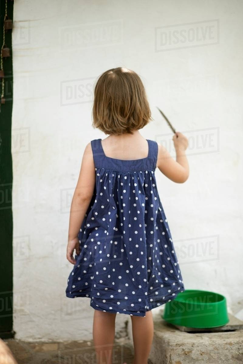 Kid drawing on wall - Royalty-free Stock Photo | Dissolve