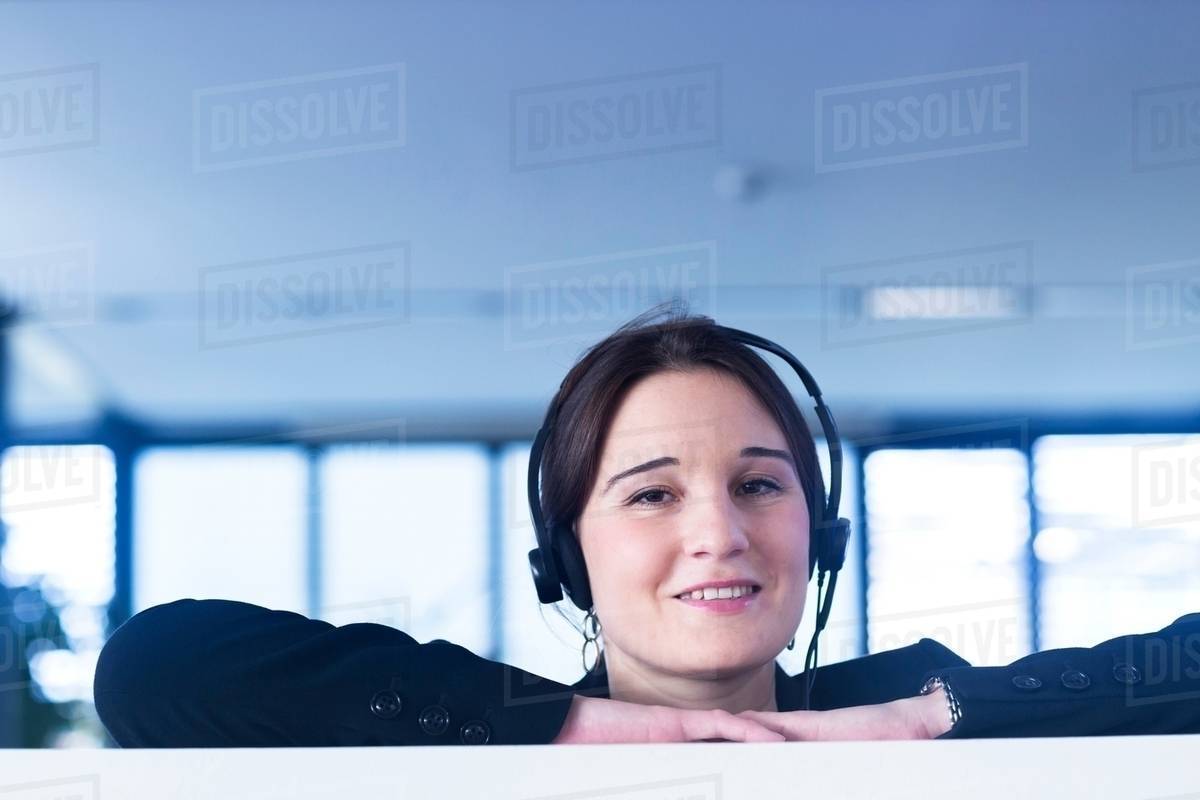 Telephonist in office - Royalty-free Stock Photo | Dissolve