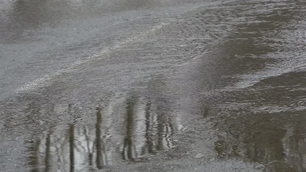 Water over road, Road flooded by overflow of a river and danger road ...