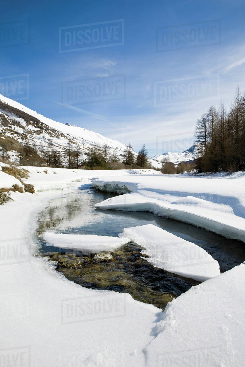 Ice floes floating on river in snowy landscape - Royalty-free Stock ...