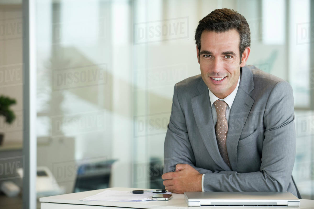 Male executive, portrait - Stock Photo - Dissolve