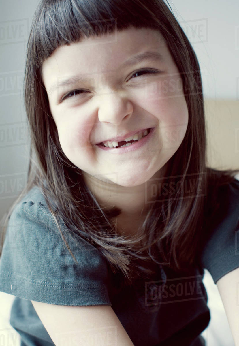 Girl smiling, portrait - Stock Photo - Dissolve