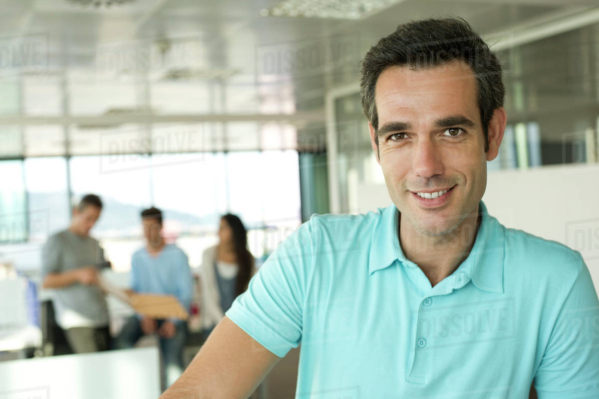 Man in office, portrait - Royalty-free Stock Photo | Dissolve