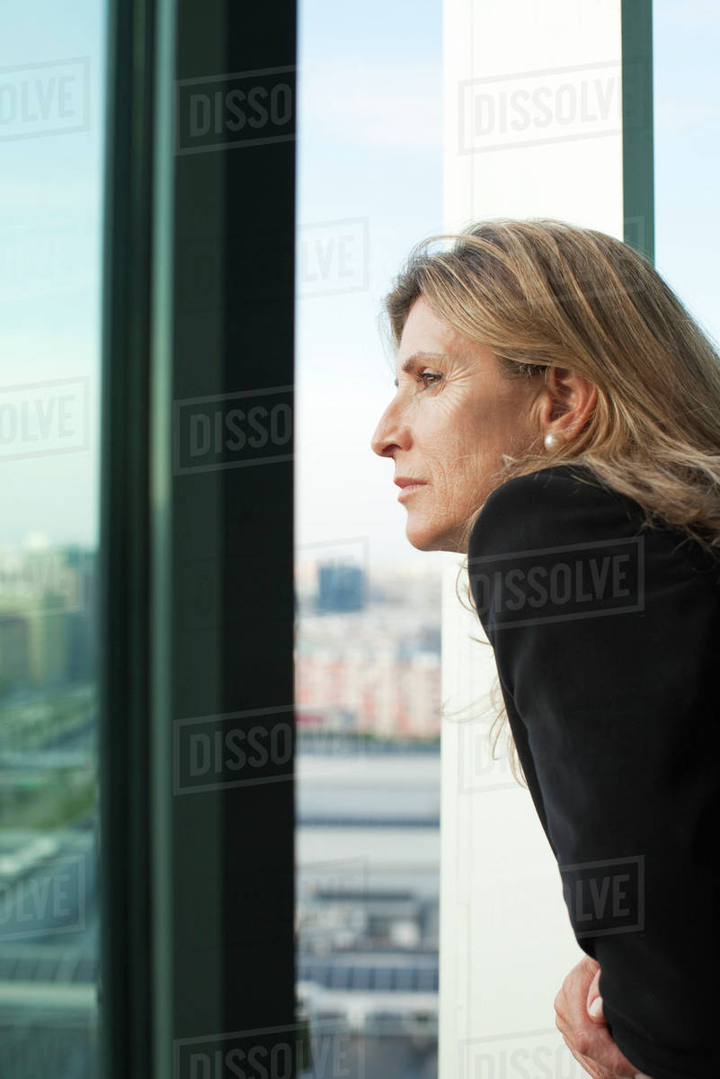 Woman looking at view - Royalty-free Stock Photo | Dissolve