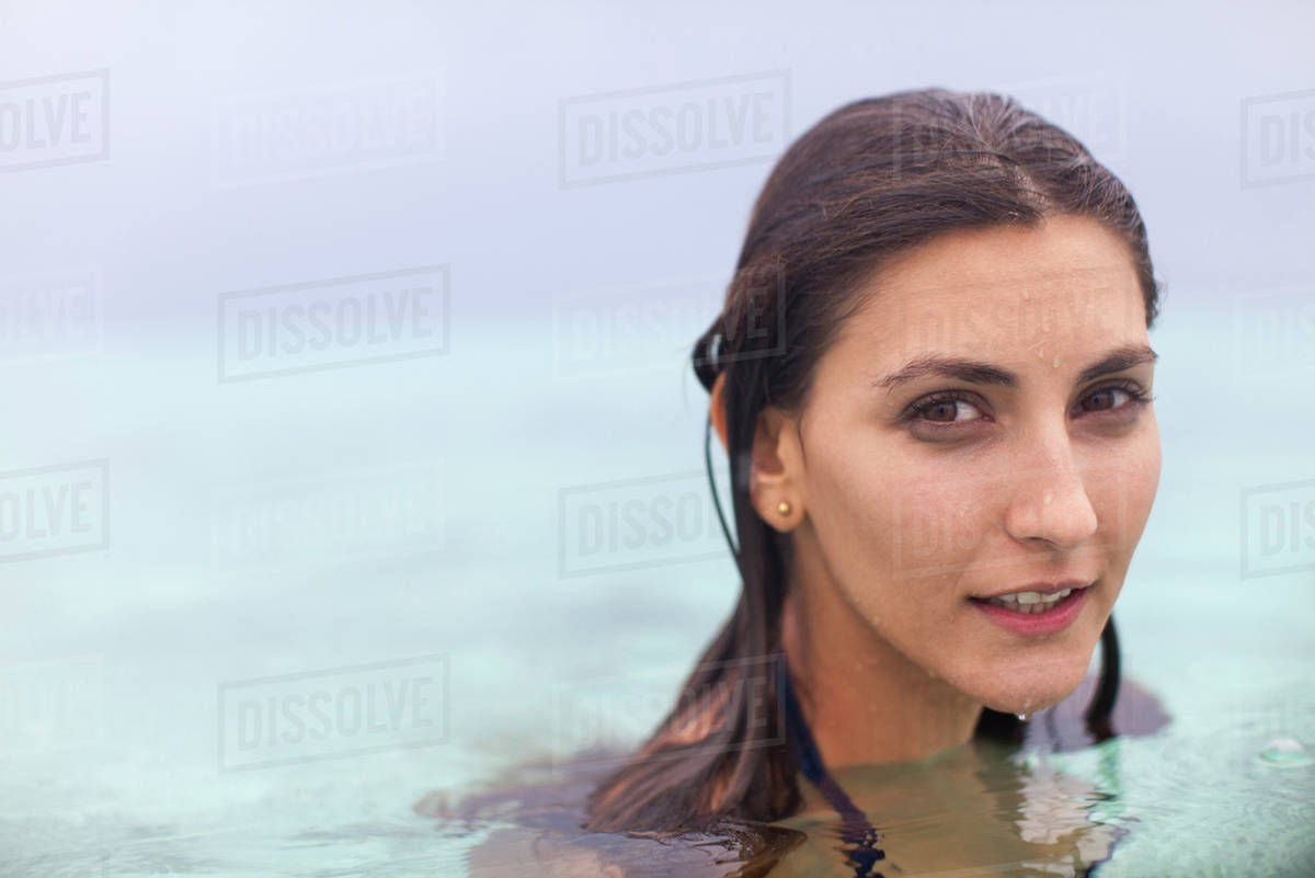 Woman swimming, portrait - Royalty-free Stock Photo | Dissolve