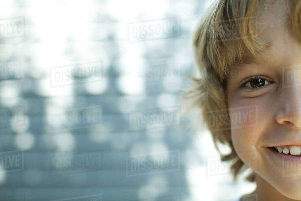 Boy smiling at camera, cropped portrait - Royalty-free Stock Photo ...