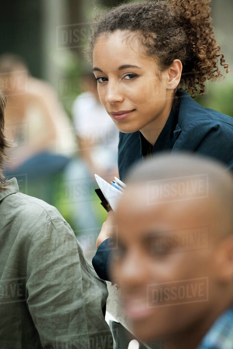Young woman with friends, focus on one person - Royalty-free Stock ...